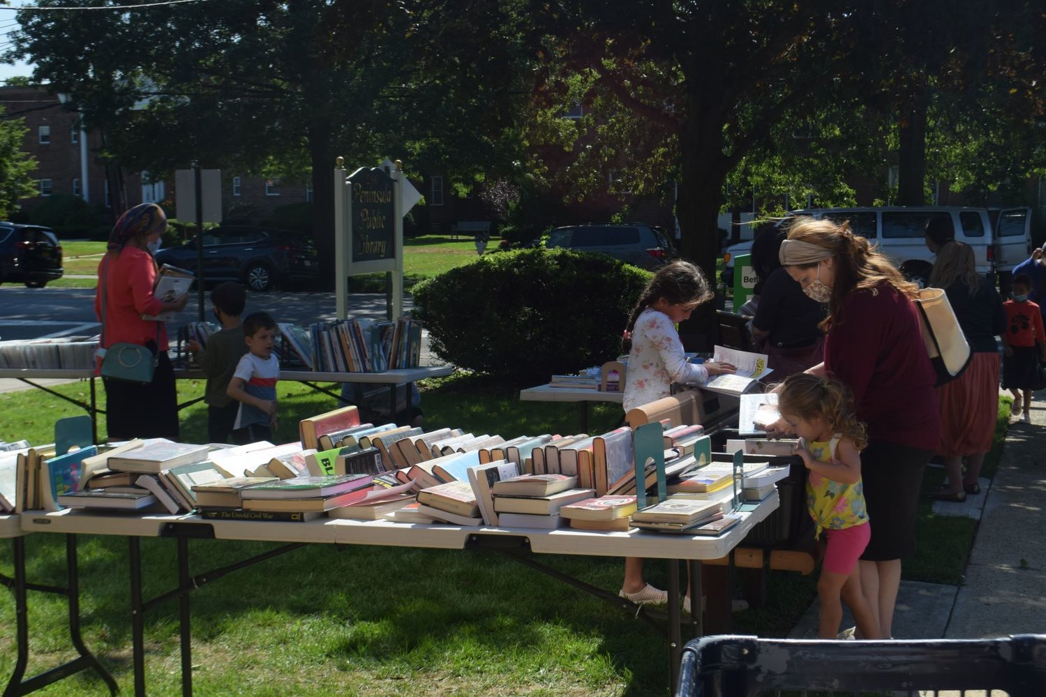 Peninsula Public Library in Lawrence holds book giveaway | Herald ...