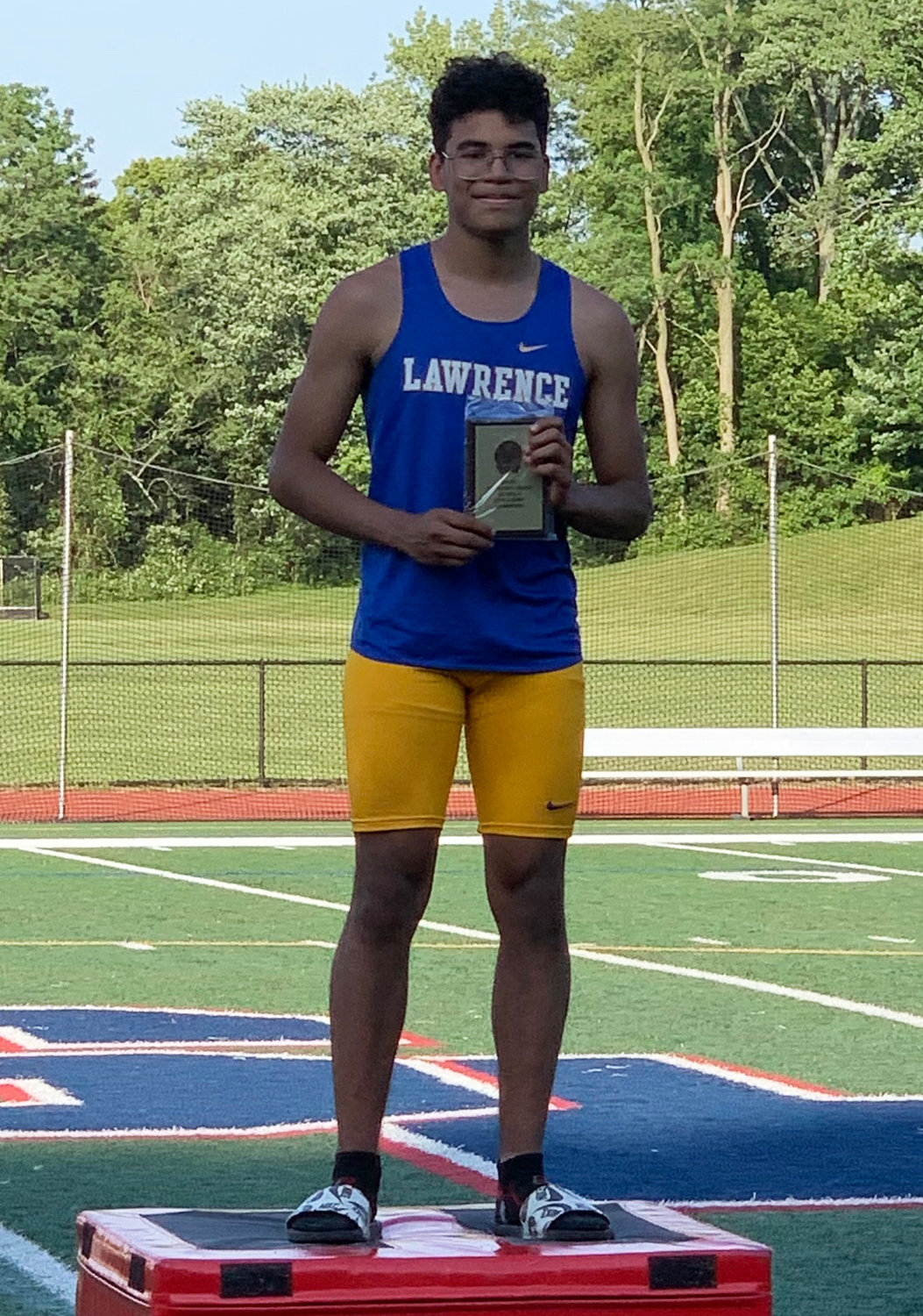 Shot put, long jump wins for Lawrence track | Herald Community ...